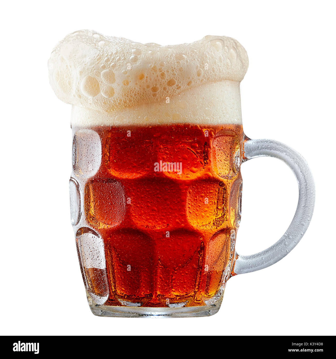 Mug of frosty dark red beer with foam Stock Photo - Alamy