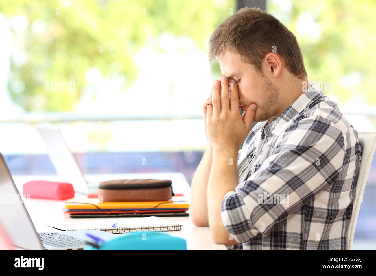 Frustrated tired college student studying hi-res stock photography and ...