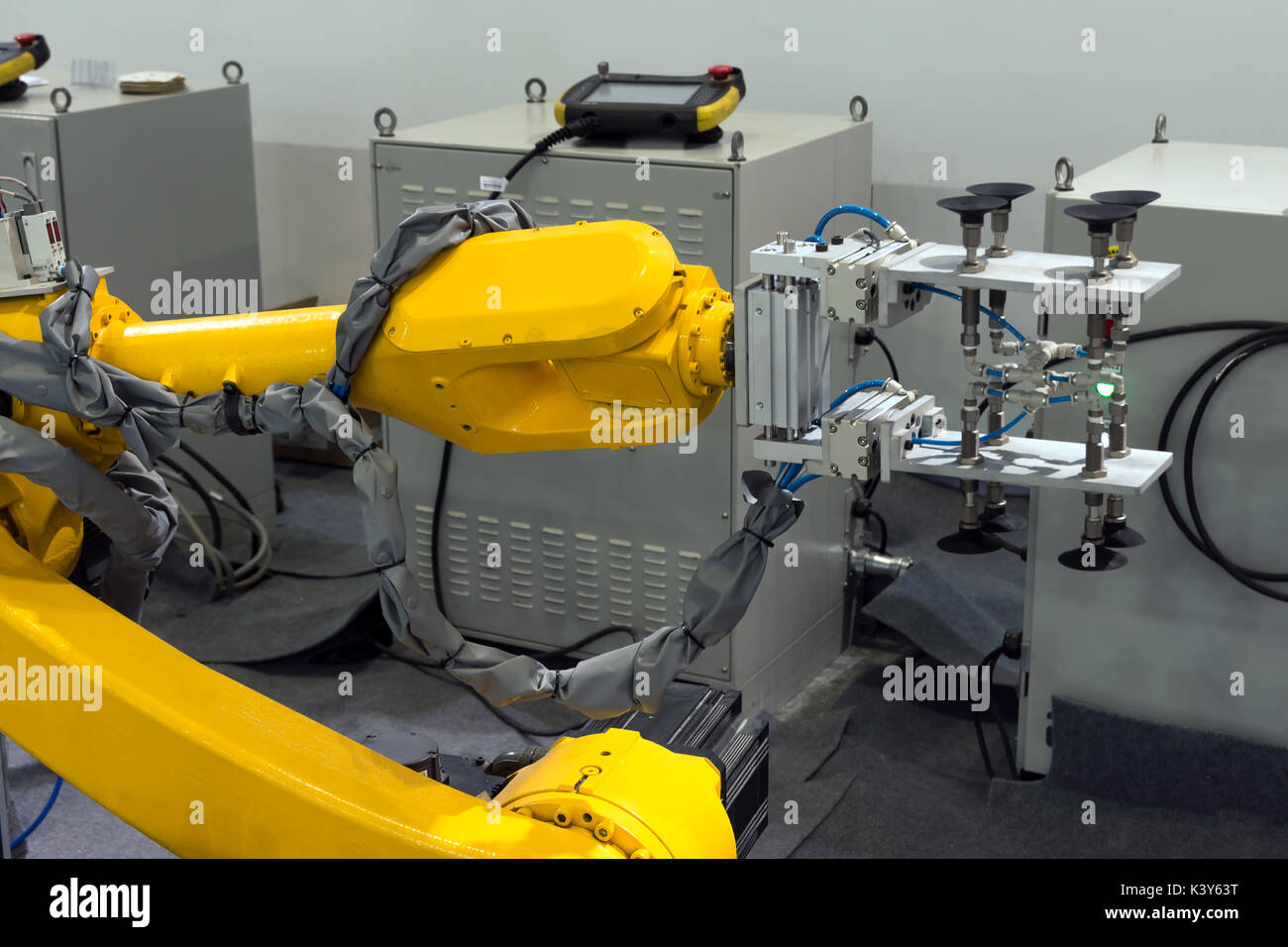 Manufacturing production industrial machine , factory robot arm in ...