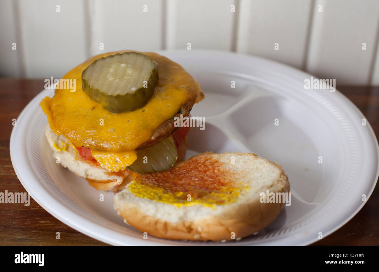 Veggie cheeseburger with pickles and ketchup Stock Photo - Alamy
