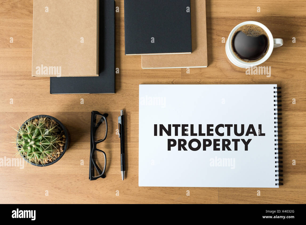 INTELLECTUAL PROPERTY Business team hands at work with financial ...