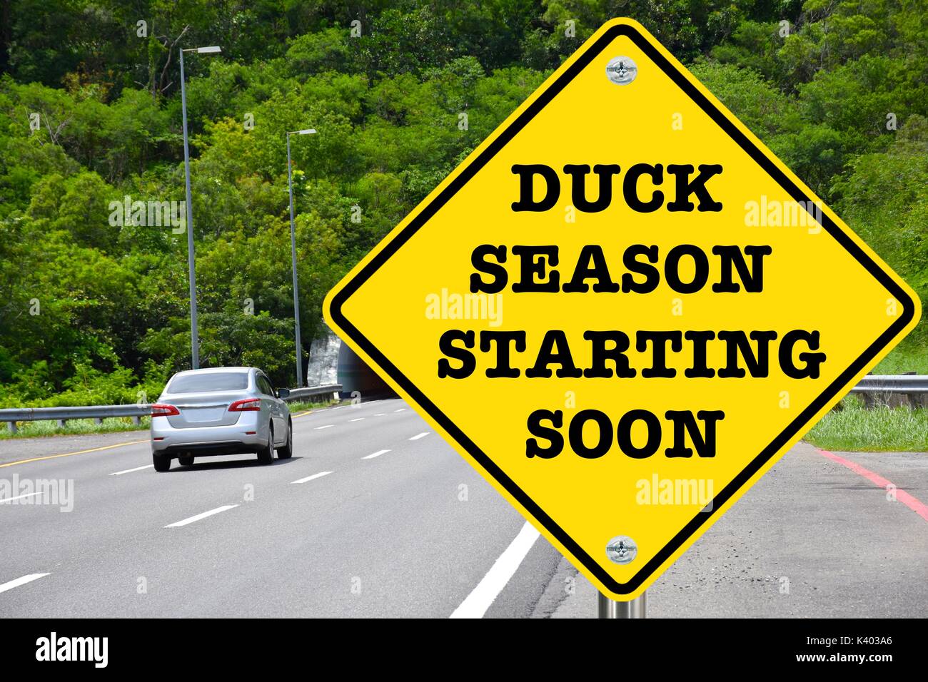 Duck Season Starting Soon, yellow warning street sign Stock Photo - Alamy