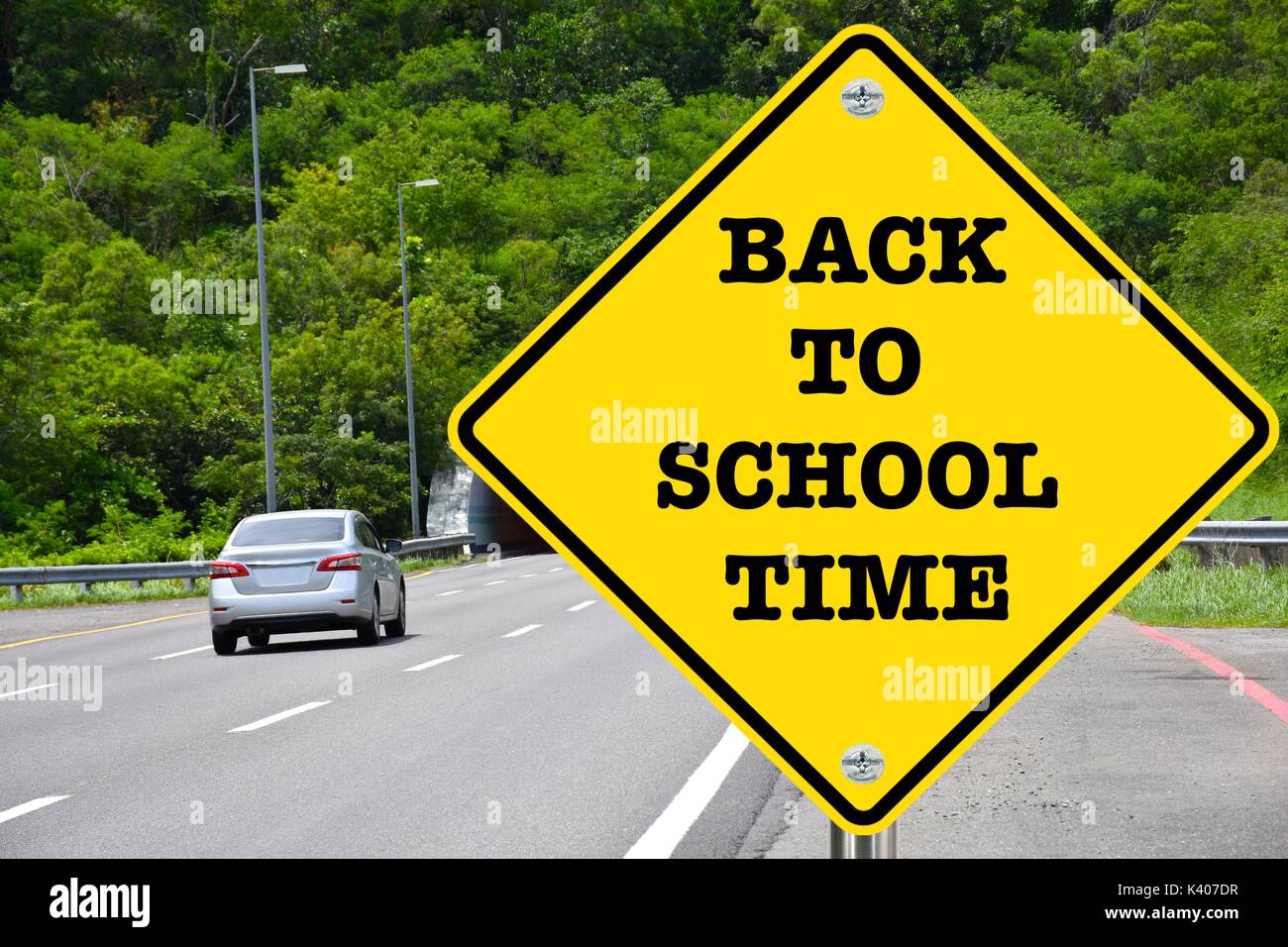 Back to school time, road sign Stock Photo - Alamy