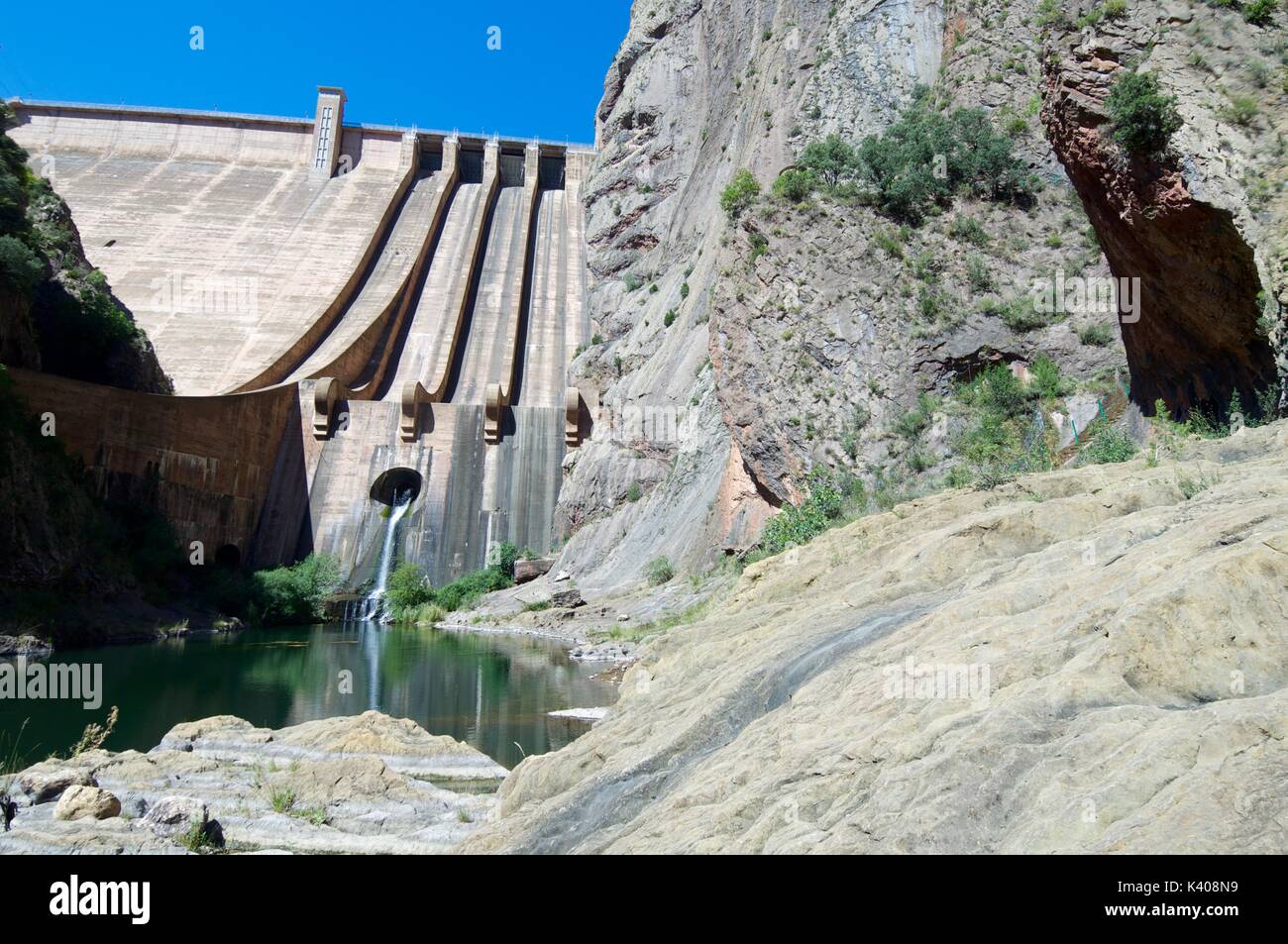 Hydroelectric dam with blue sky in Spain Stock Photo - Alamy