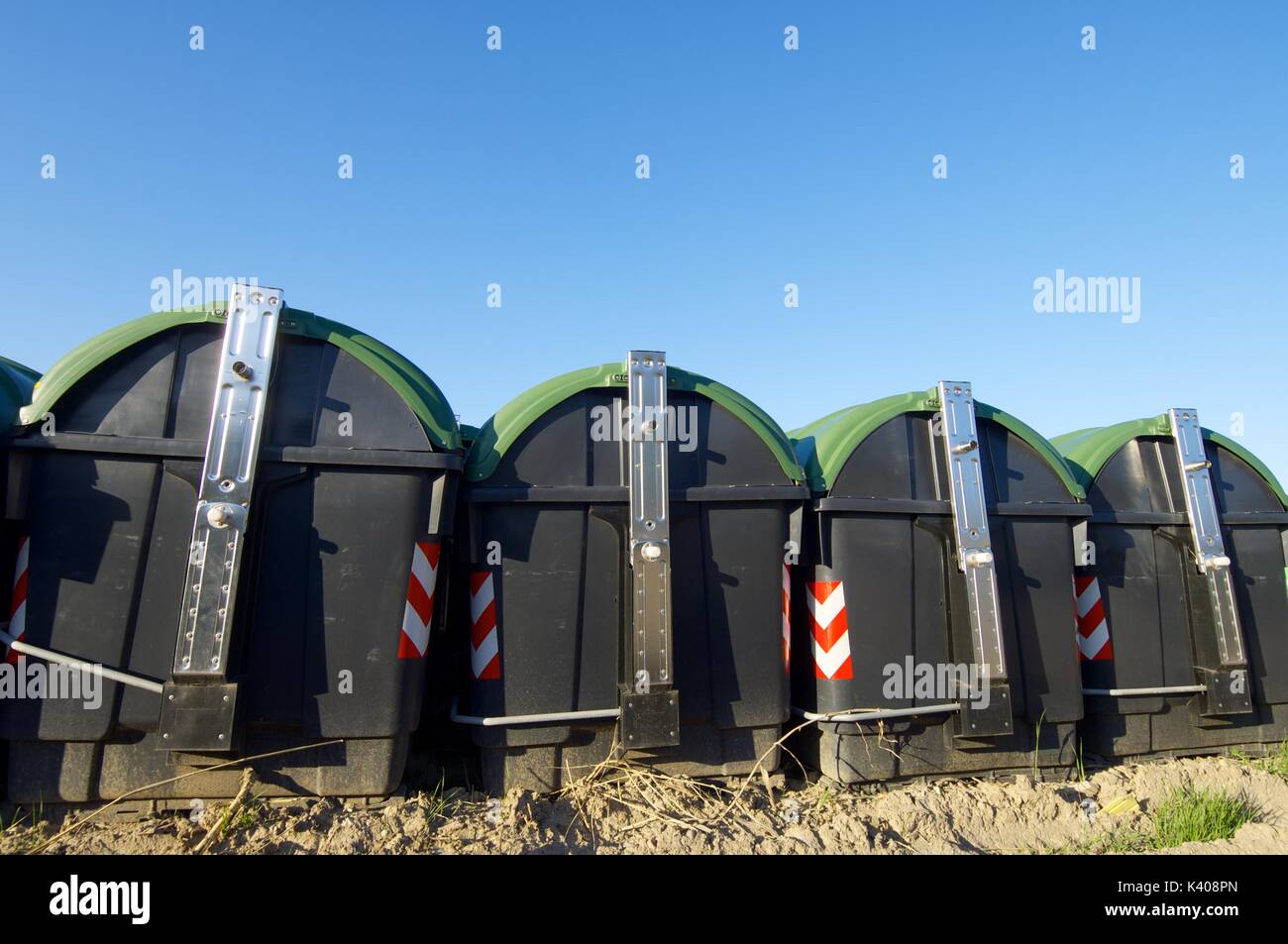 Bins group for garbage and clear sky Stock Photo - Alamy