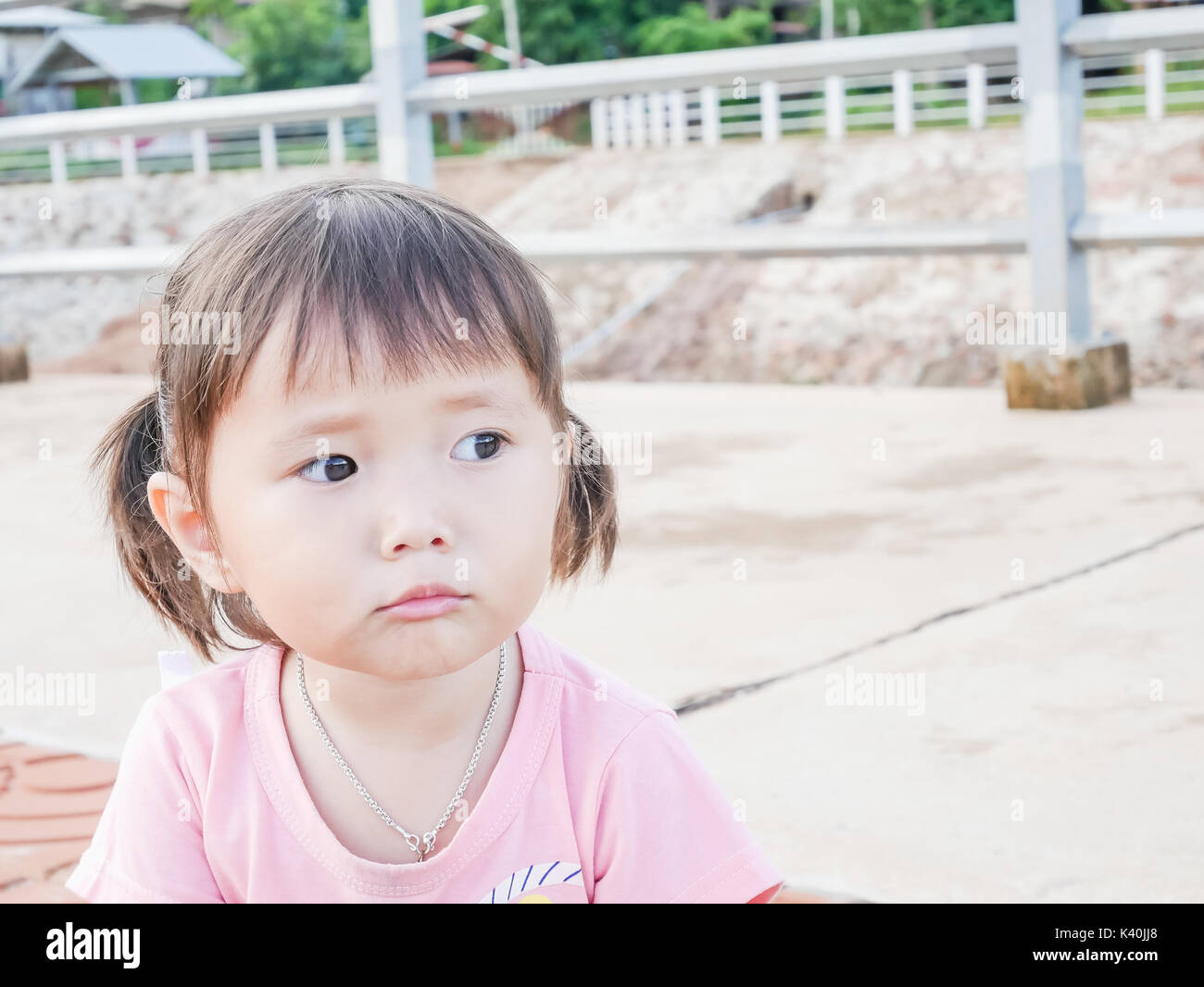 Child frowning hi-res stock photography and images - Alamy