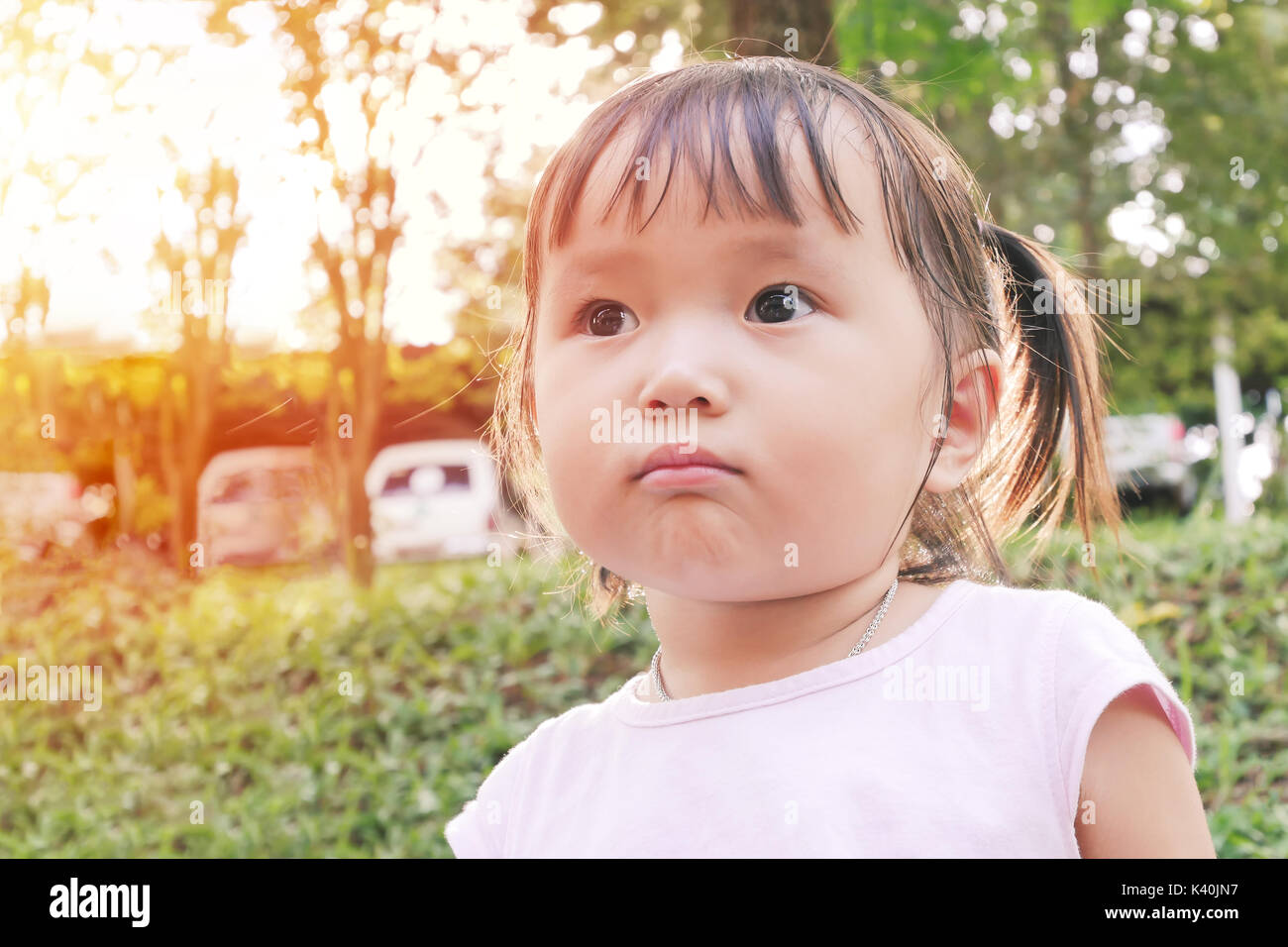 Frowning child hi-res stock photography and images - Alamy