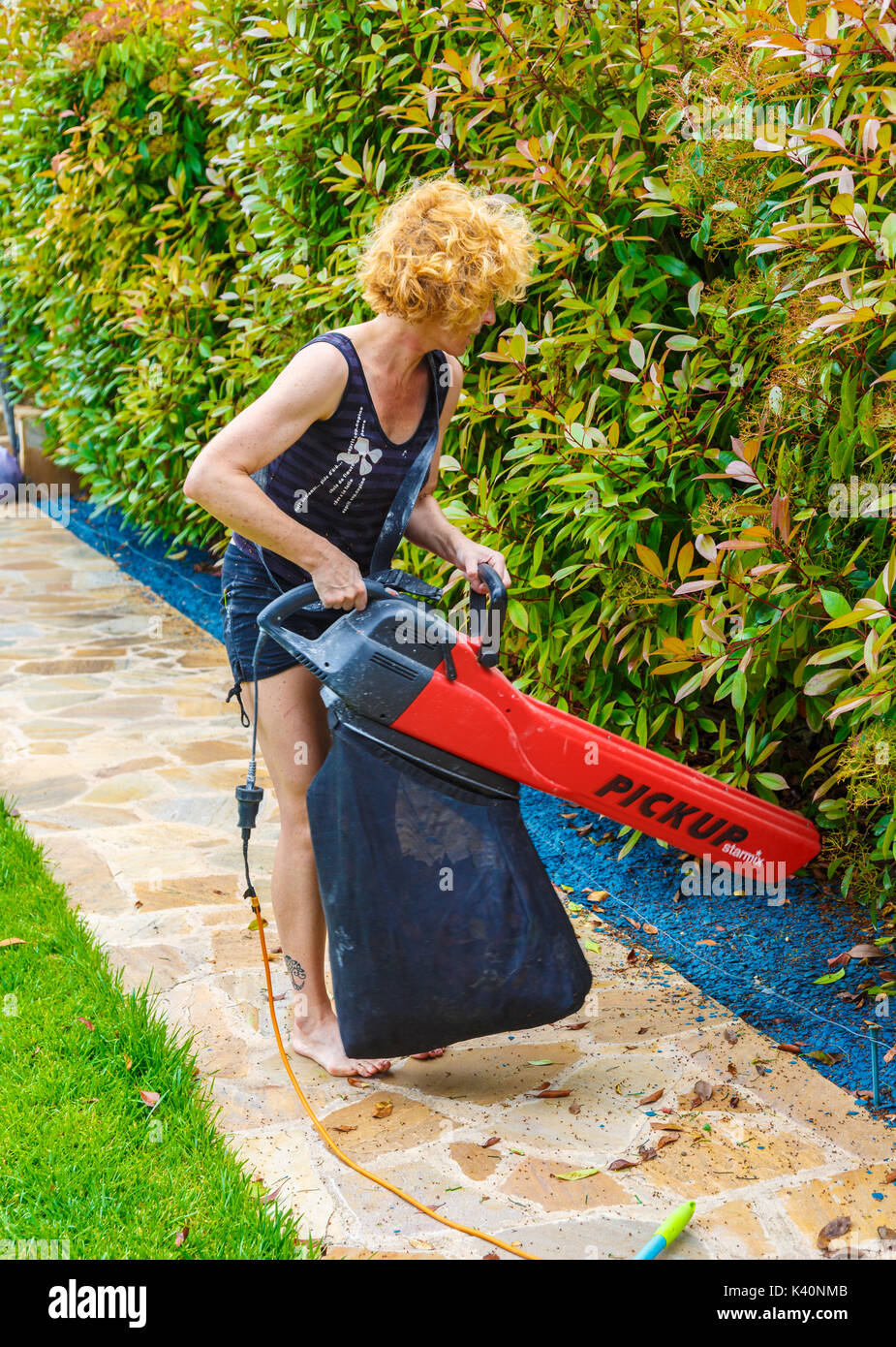 Leaf blower female hi-res stock photography and images - Alamy
