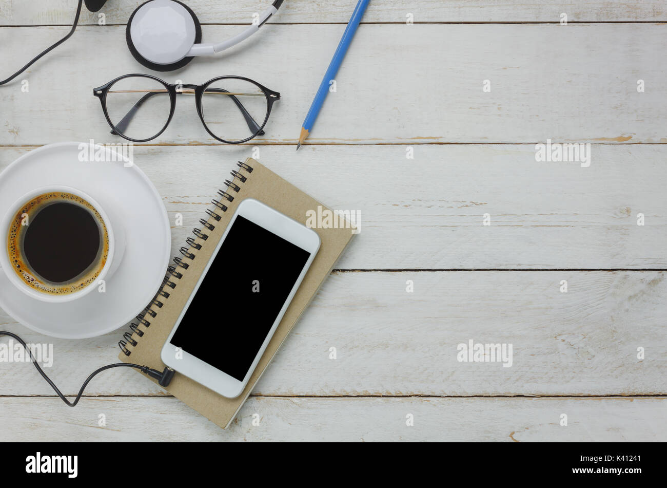 Table top view of technology on business desk background concept.Mix ...