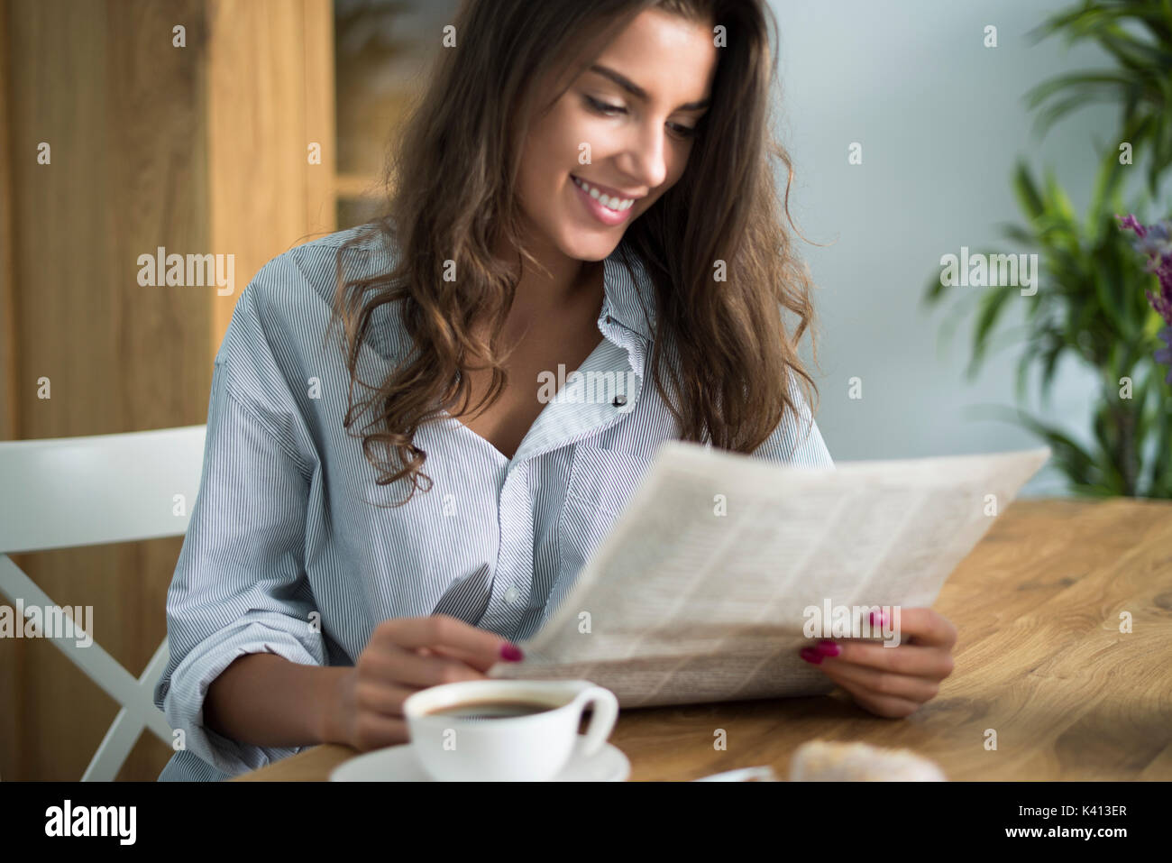 Good morning starts with reading newspaper Stock Photo - Alamy