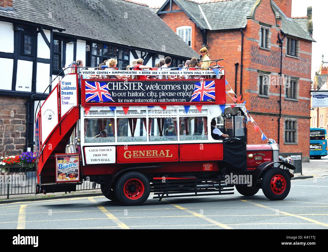 Tour bus on corner of Bridge Street and Grosvenor Street, Chester ...