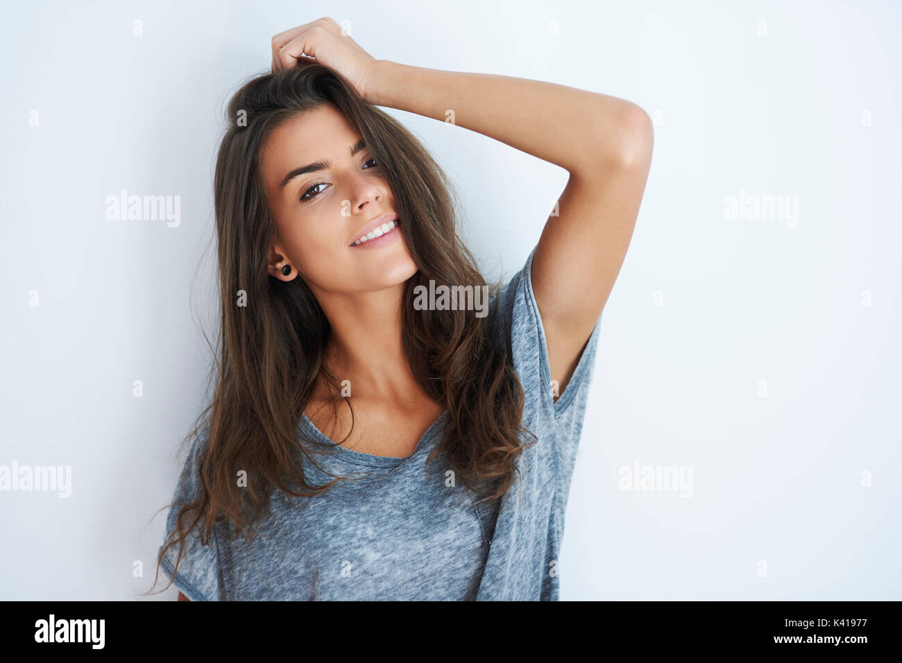 Portrait of smiling attractive woman Stock Photo - Alamy