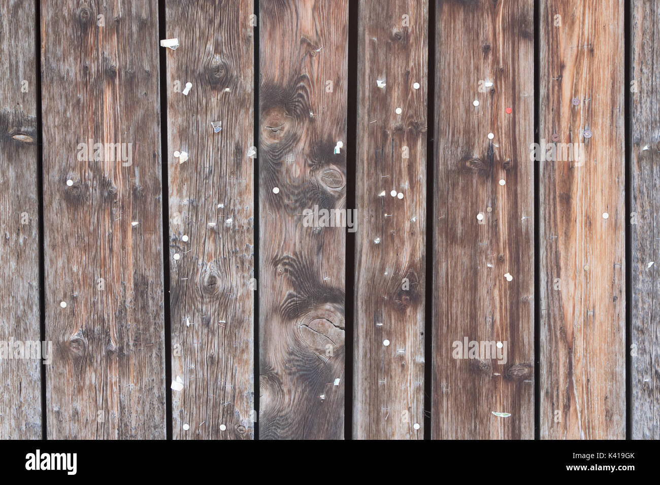 Wooden panel used for posters and messages - Full of pushpins and ...