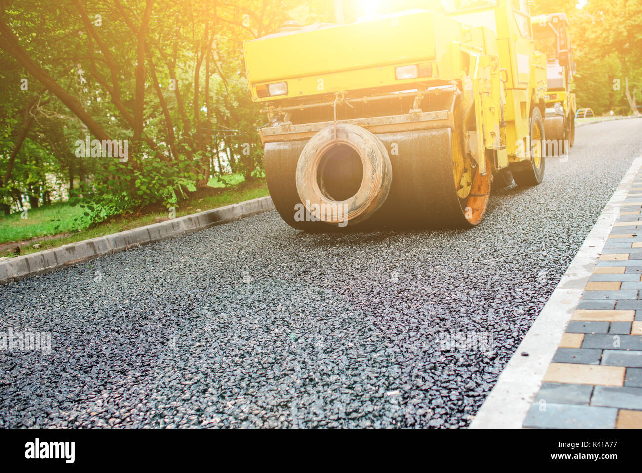 Road paving machine stacking asphalt hi-res stock photography and ...