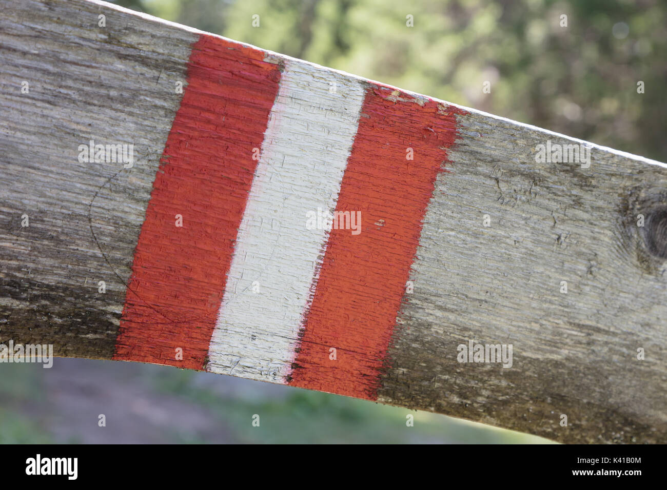 Walking path sign in Austria, flag painted on a wooden fence Stock ...