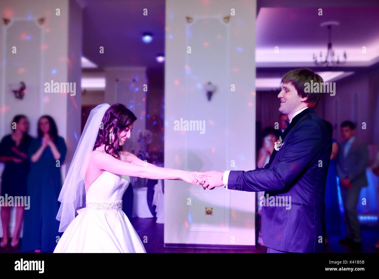 Wedding couple in the restaurant is dancing Stock Photo - Alamy
