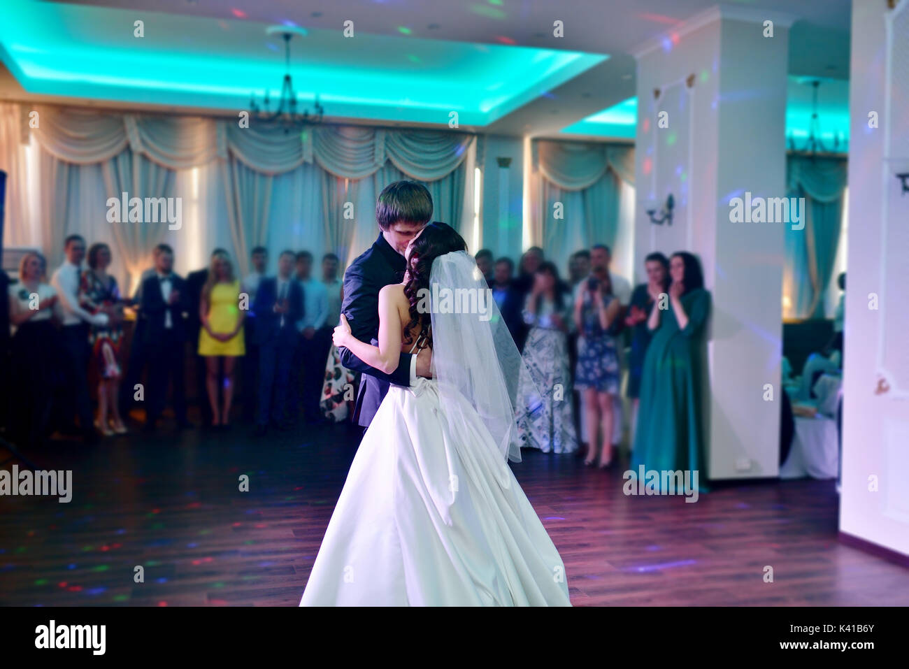 Wedding couple in the restaurant is dancing Stock Photo - Alamy