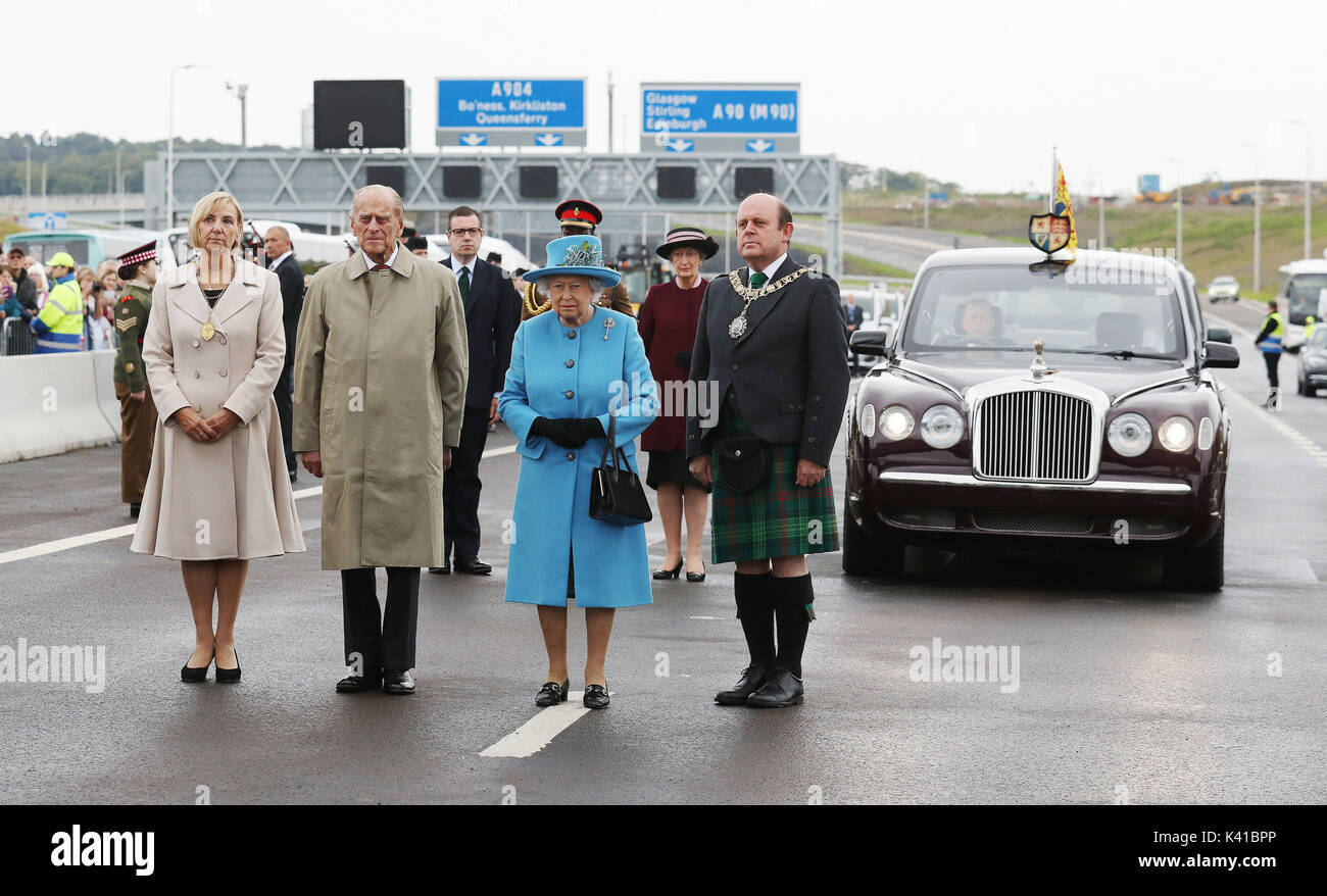 Queen Elizabeth II and the Duke of Edinburgh on, along the Queensferry ...