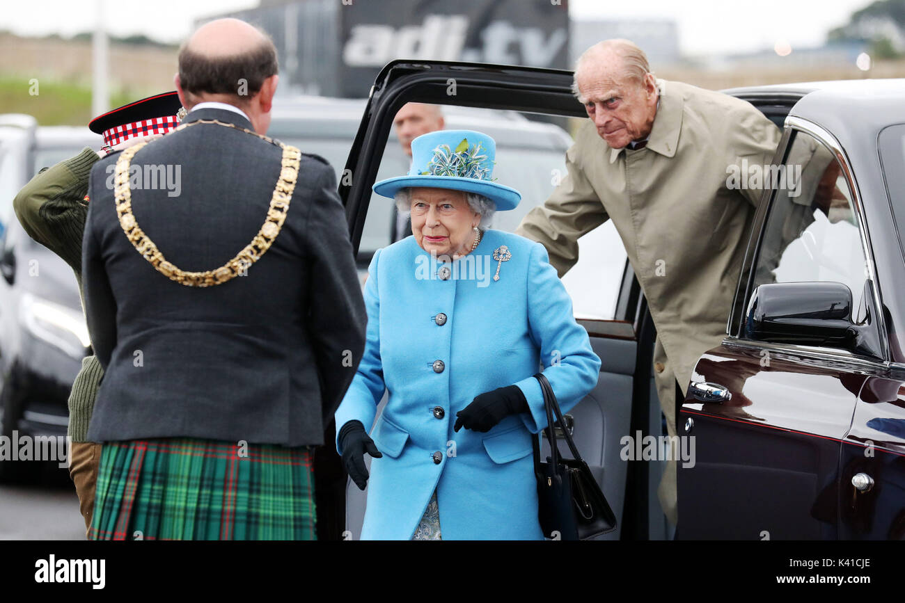 Queen Elizabeth II and the Duke of Edinburgh arrive along the ...