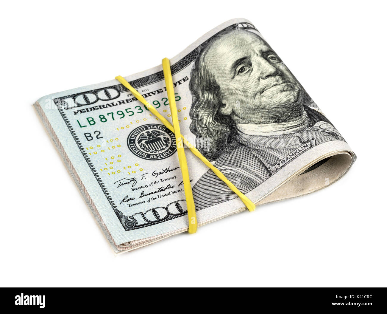 Collapsed dollars on a white background Stock Photo - Alamy