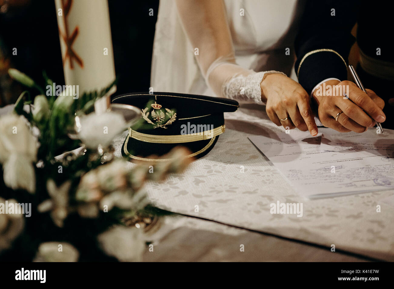 Bride groom signing marriage certificate hi-res stock photography and ...
