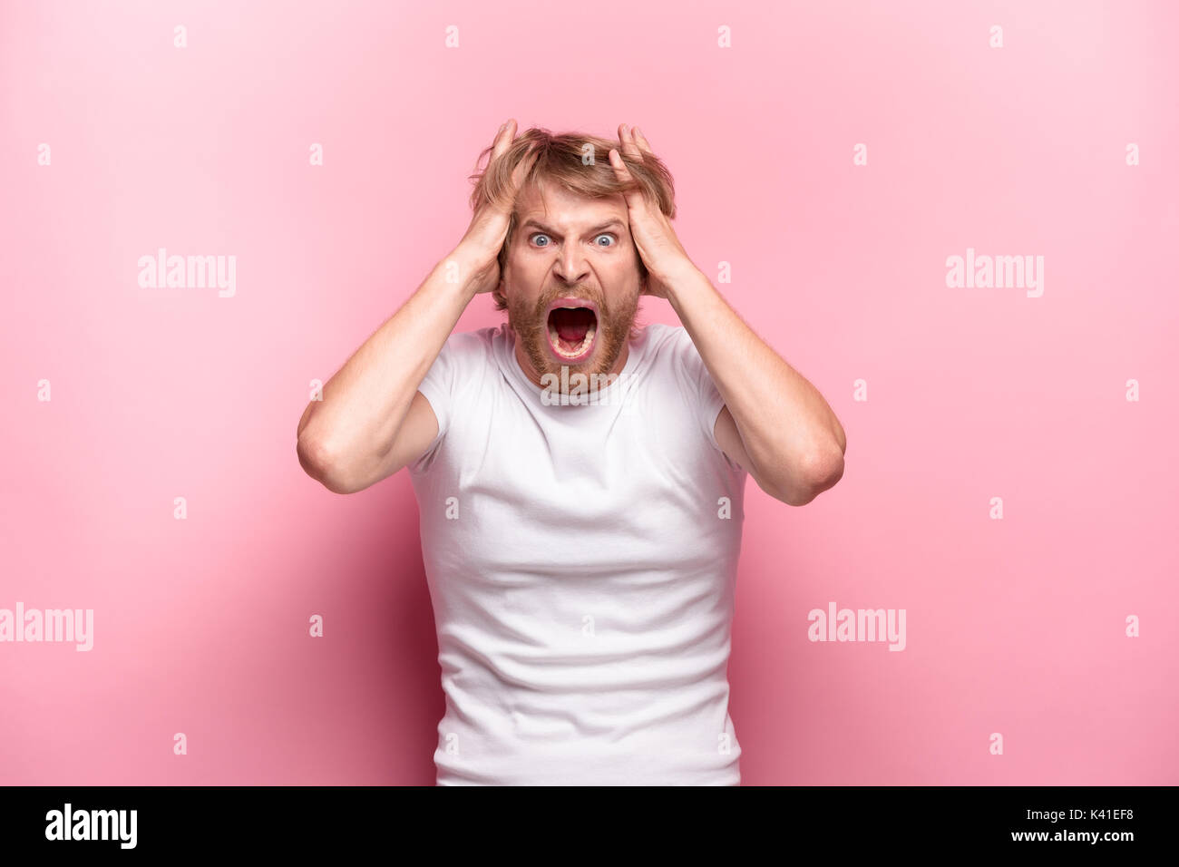 The anger and screaming man Stock Photo - Alamy