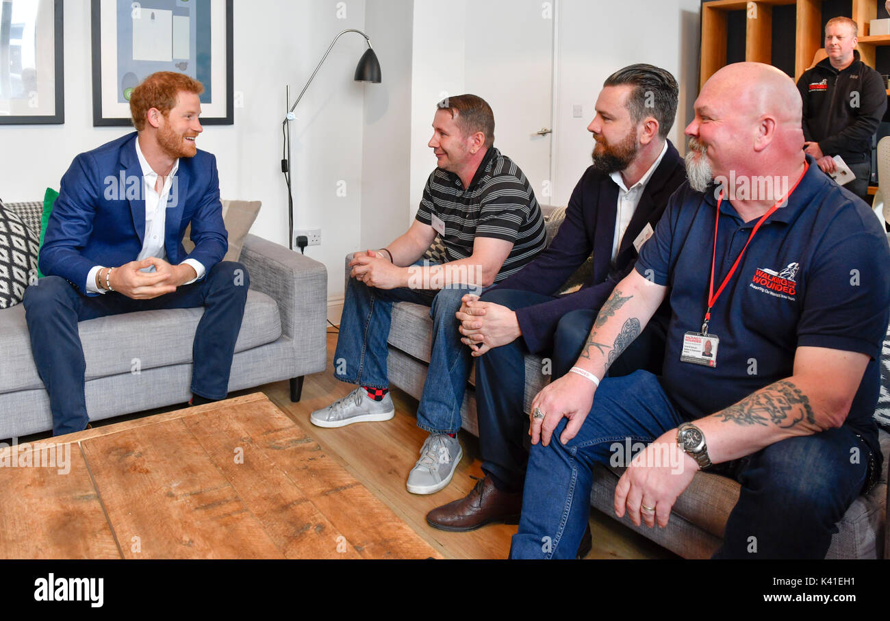 Prince Harry meets (second left-right) Jimmy Owen, Duncan Sagar and ...