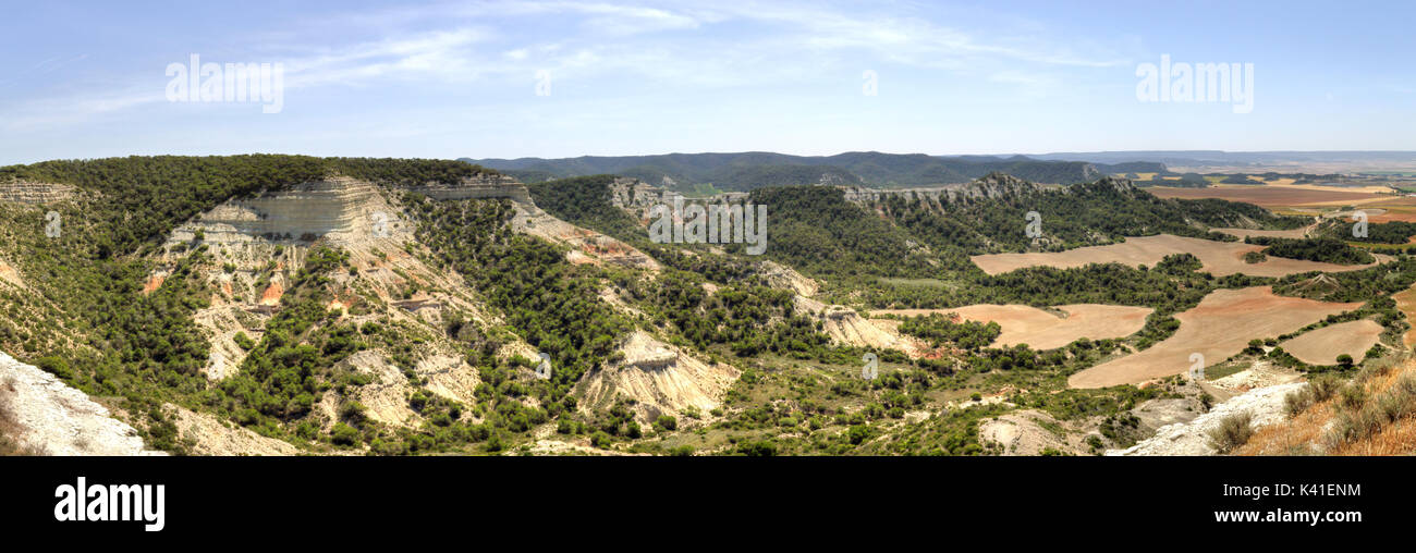 A spanish landscape with cultivated fields, mountains and trees in the ...