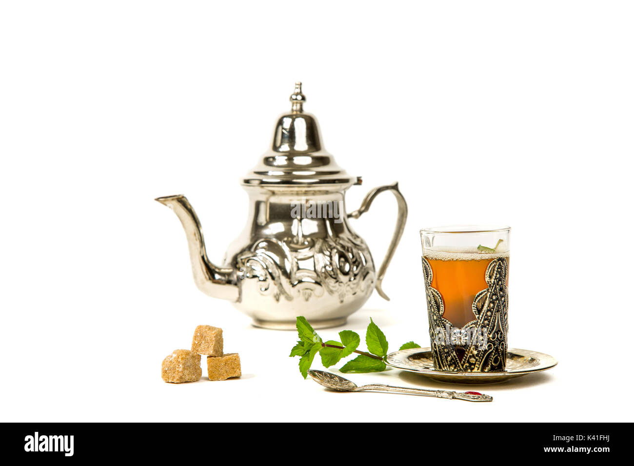 True Moroccan mint tea in the original cup and teapot on the white ...