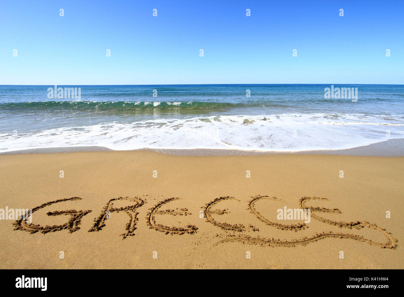 “Greece” written on golden sandy beach Stock Photo - Alamy