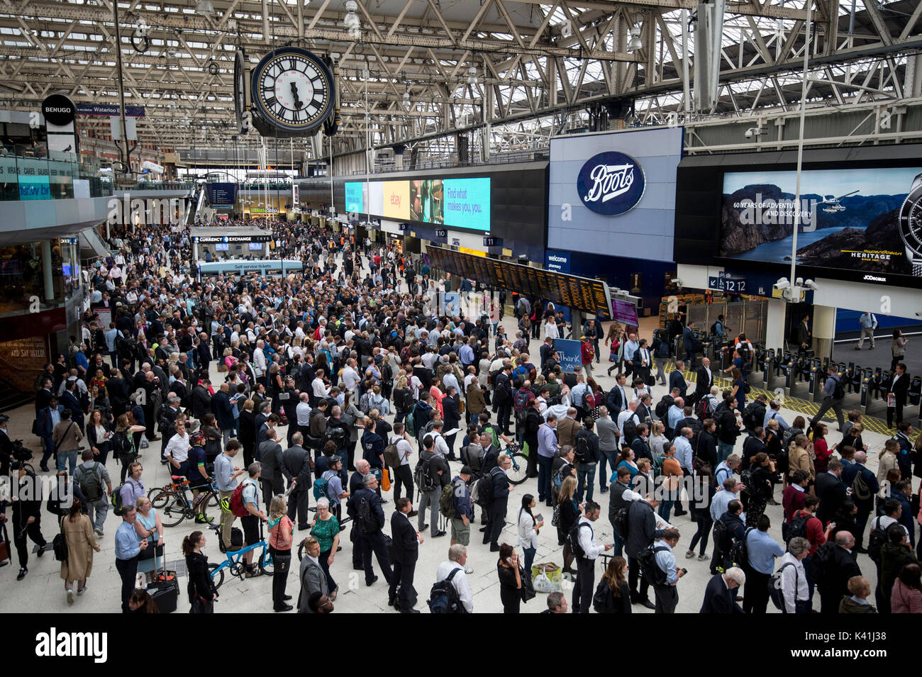 Commuters on the concourse during the evening rush hour at Waterloo ...