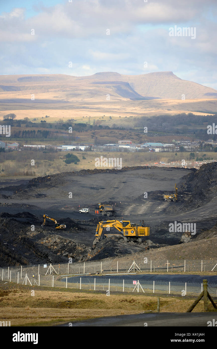 Tipper lorry being loaded with overburden at Ffos Y Fran Stock Photo ...