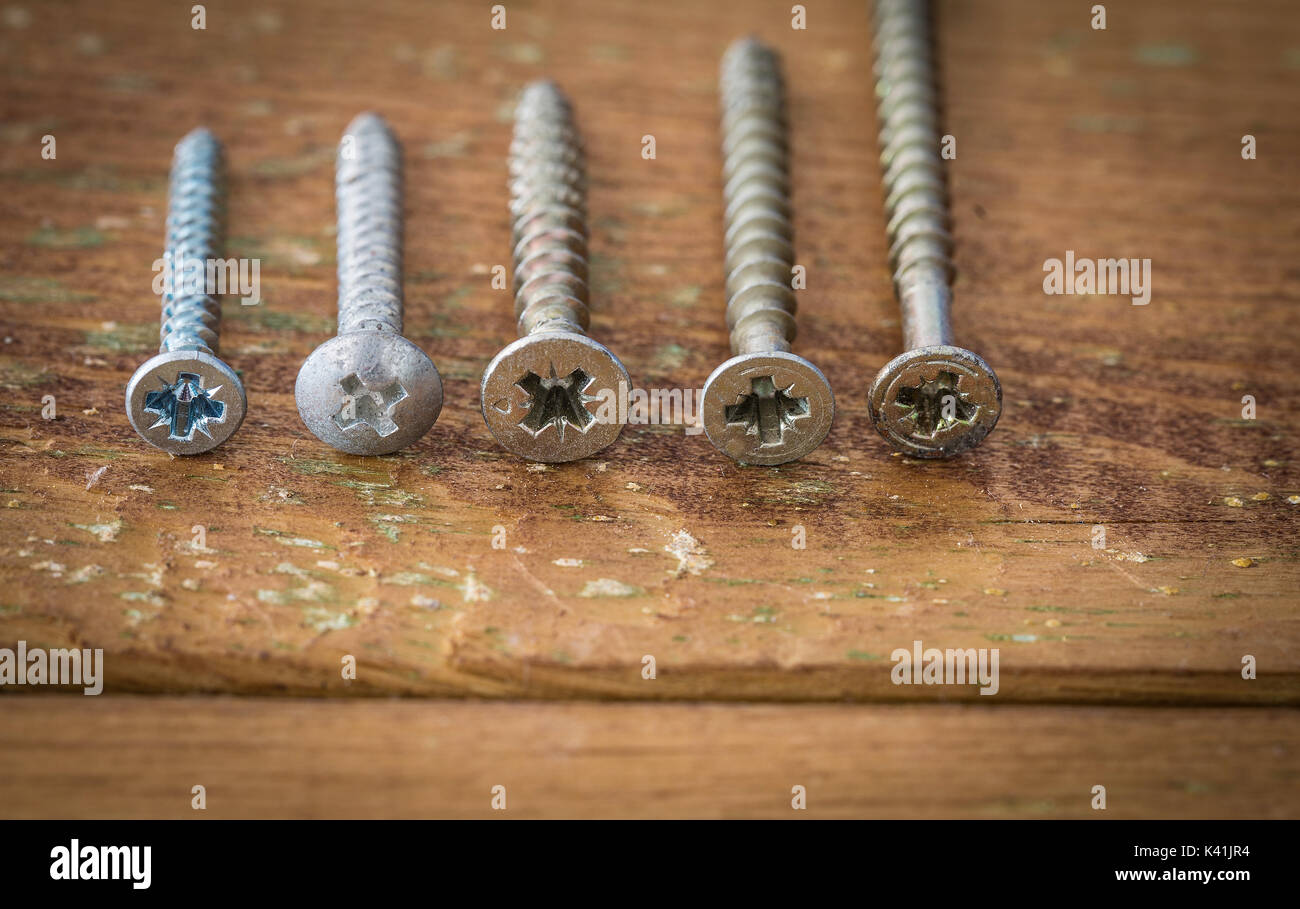 Group of old oxide vintage tools. screws Stock Photo - Alamy