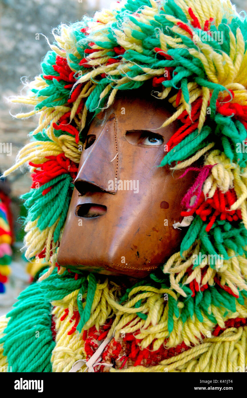 Traditional wool costumes and masks during carnival. Podence, Tras os ...