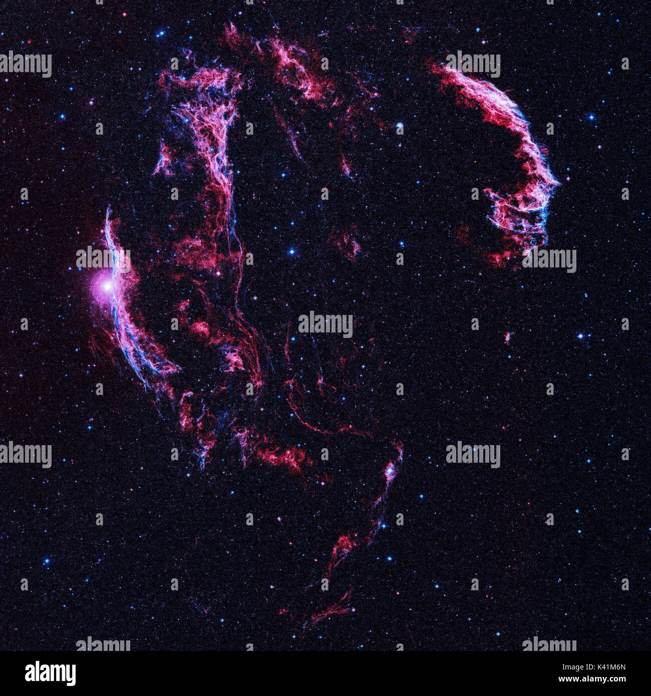 The Veil Nebula or NGC 6960 is a cloud of heated and ionized gas and ...