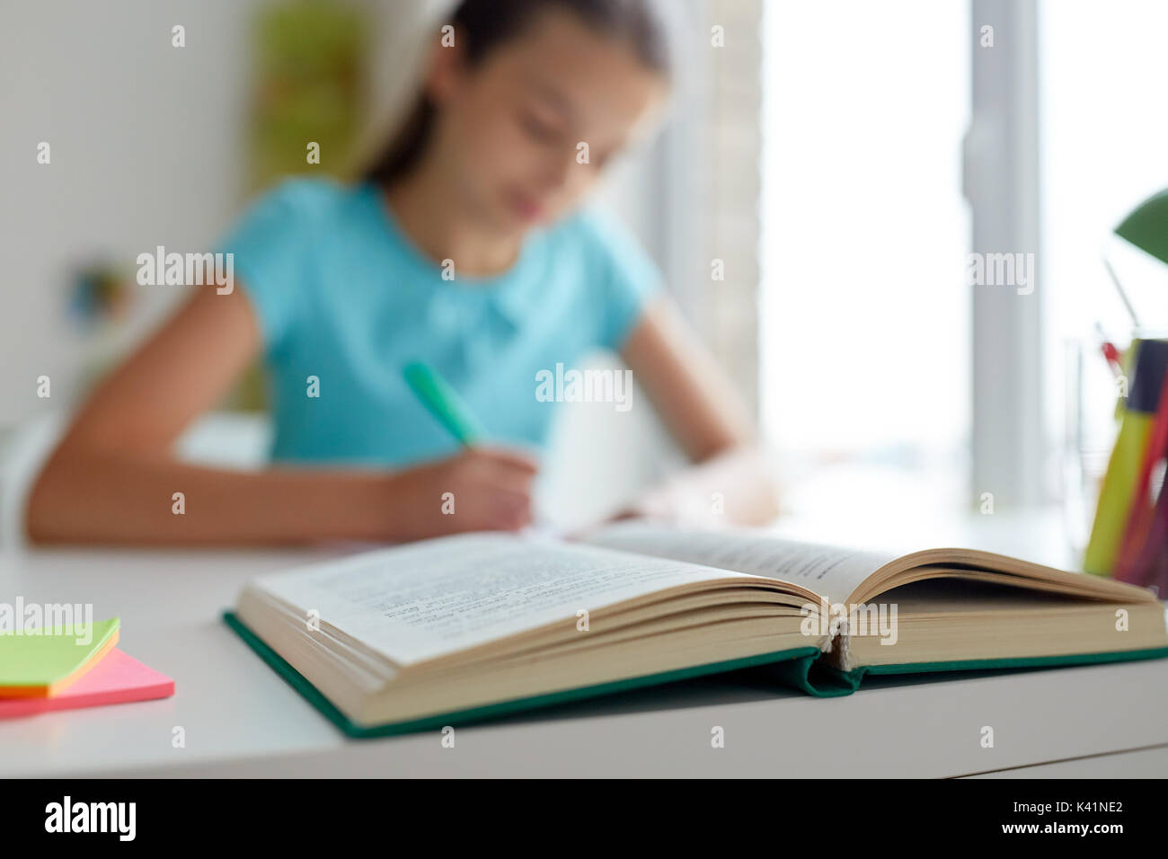Teen writing home desk hi-res stock photography and images - Alamy