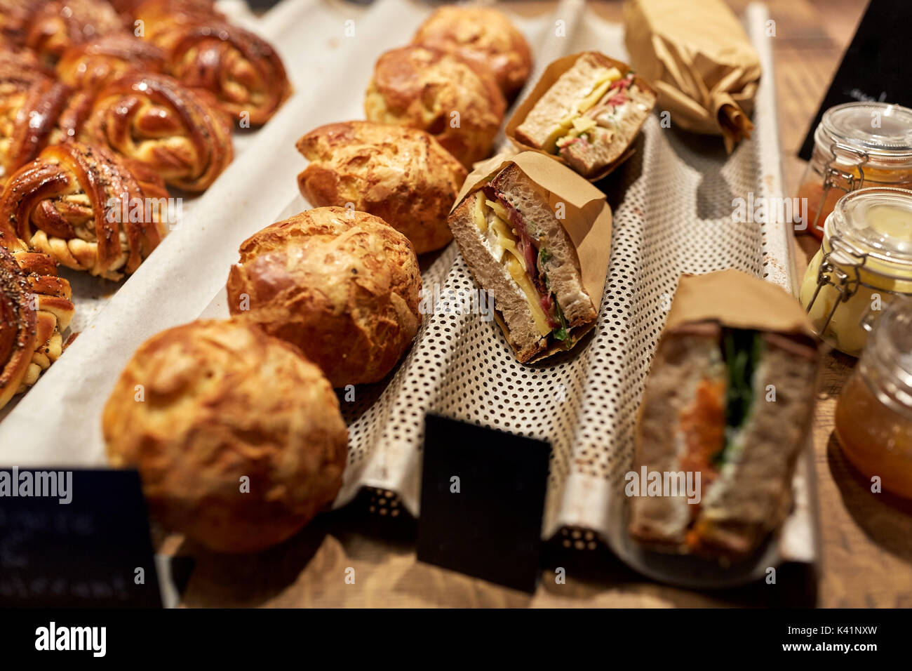 bread and sandwiches with price at grocery store Stock Photo - Alamy