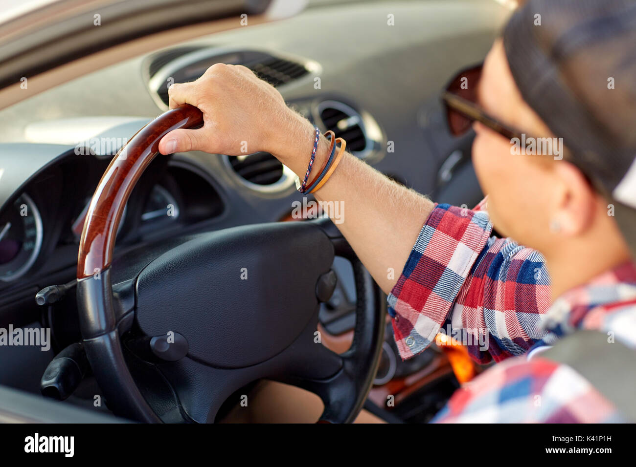 Happy man driving car hi-res stock photography and images - Alamy
