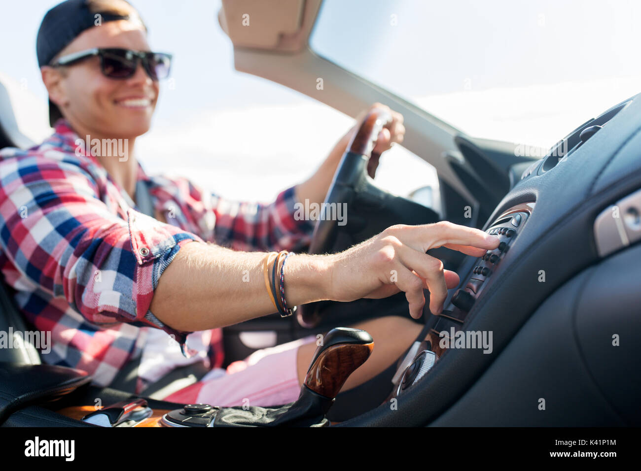 Young man driving convertible car hi-res stock photography and images ...