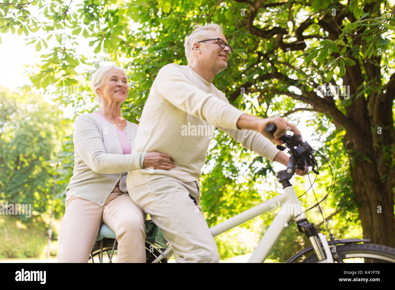 Elderly person riding bike bicycle hi-res stock photography and images ...