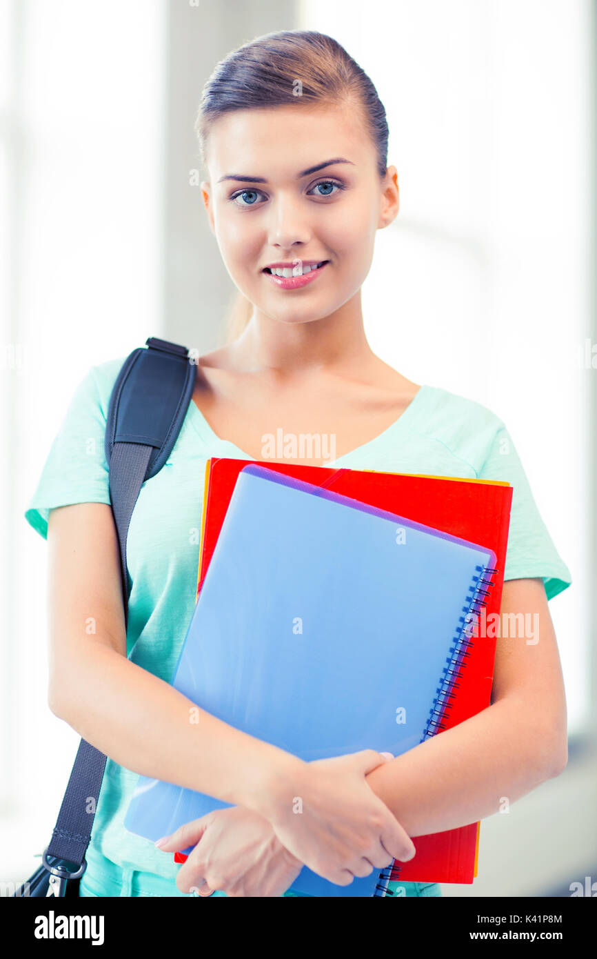 student girl with school bag and notebooks Stock Photo - Alamy