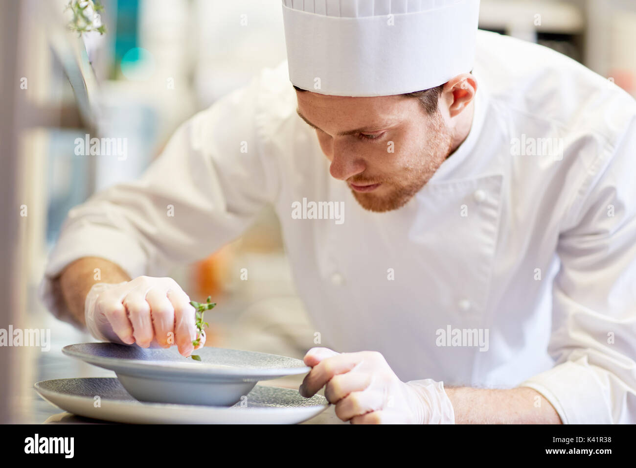 happy male chef cooking food at restaurant kitchen Stock Photo - Alamy