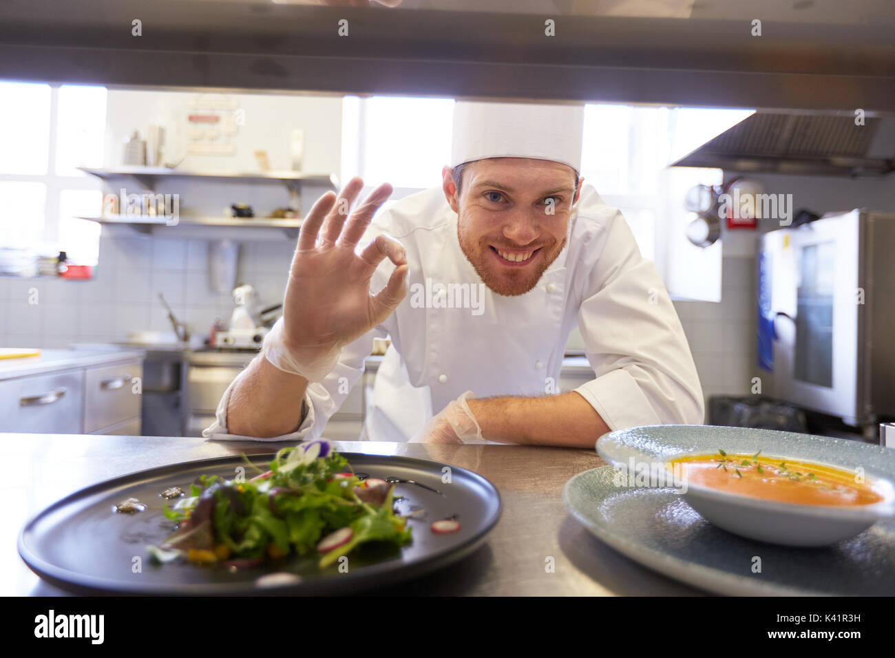 happy male chef cooking food at restaurant kitchen Stock Photo - Alamy