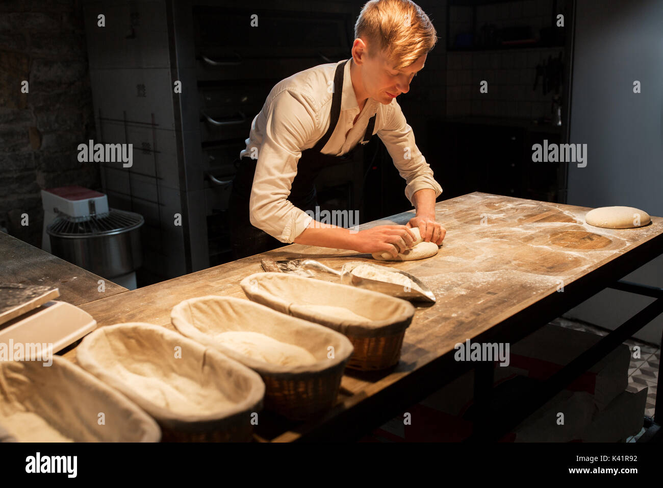 Baker making hi-res stock photography and images - Alamy