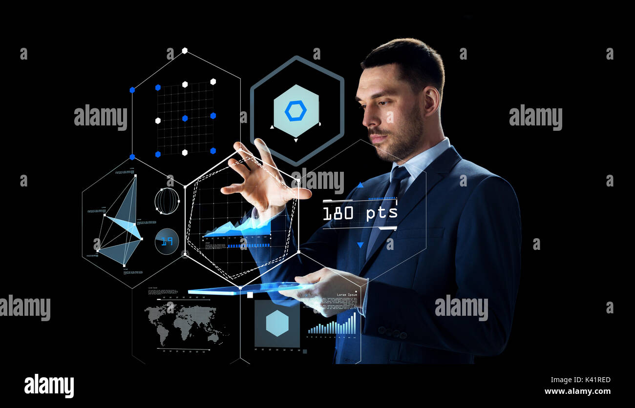 businessman with tablet pc and virtual screen Stock Photo - Alamy
