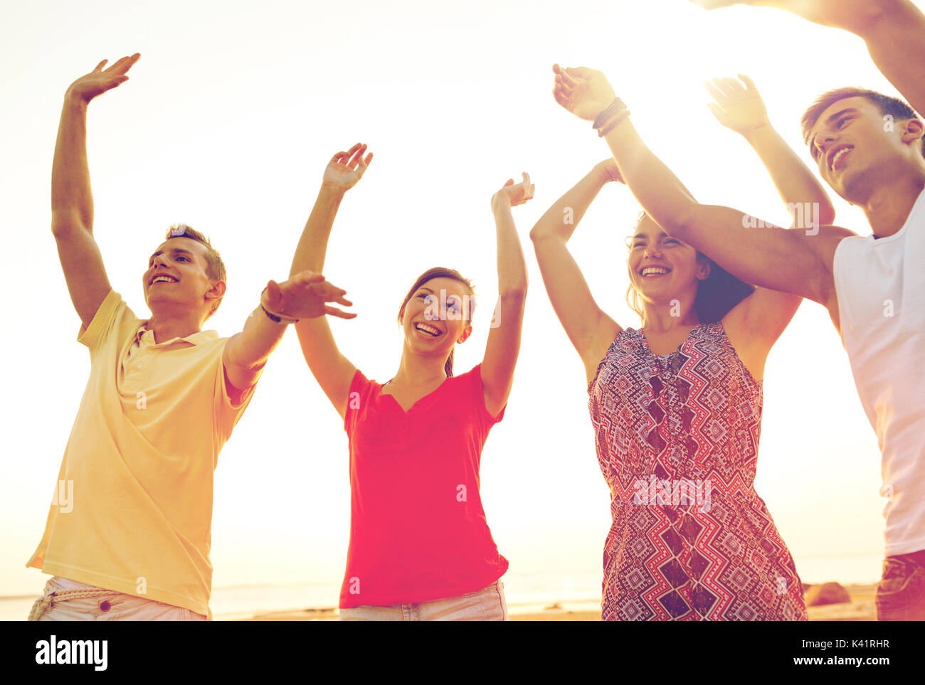 Dancing beach family hi-res stock photography and images - Alamy