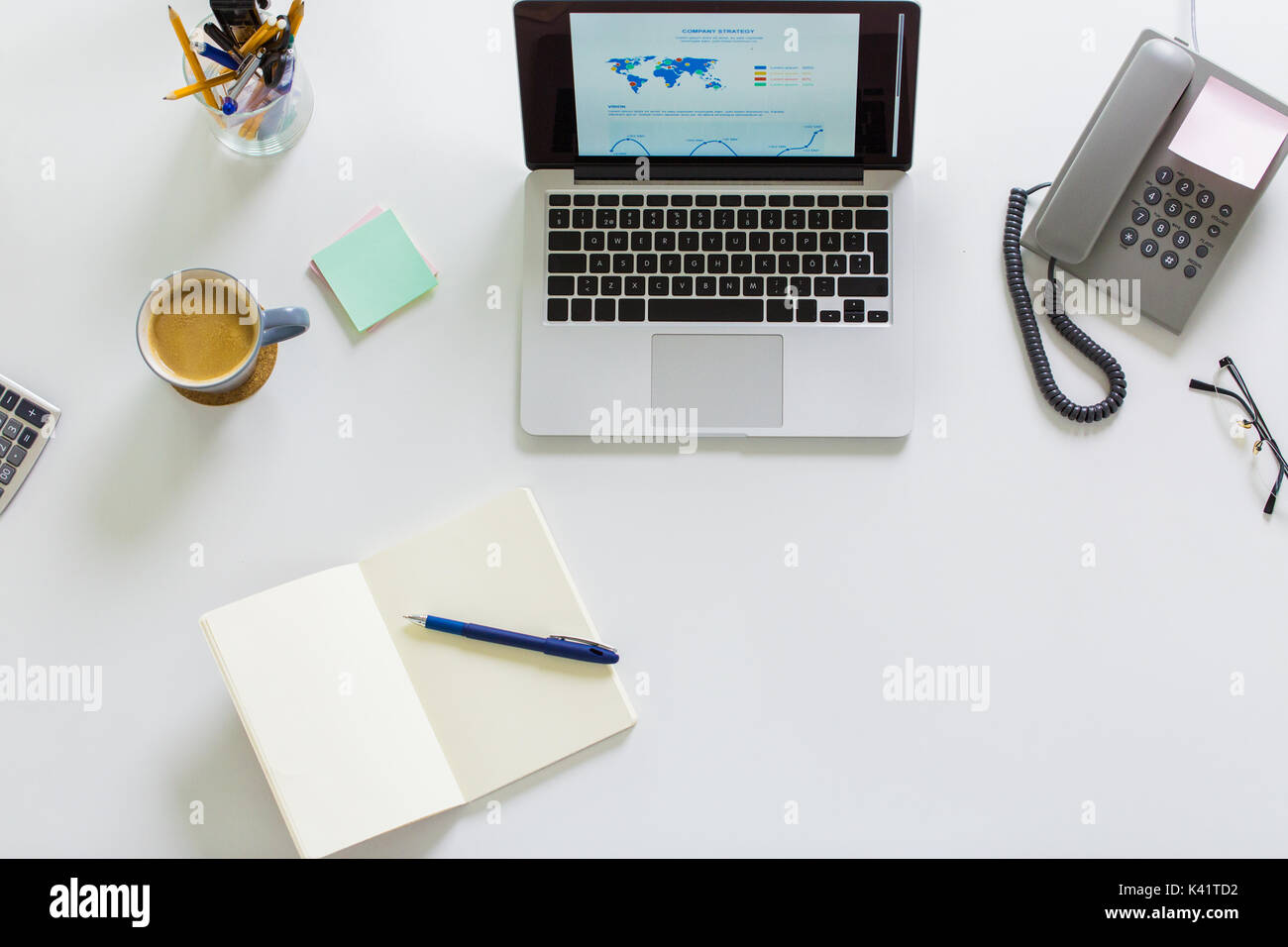 Office table with laptop hi-res stock photography and images - Alamy