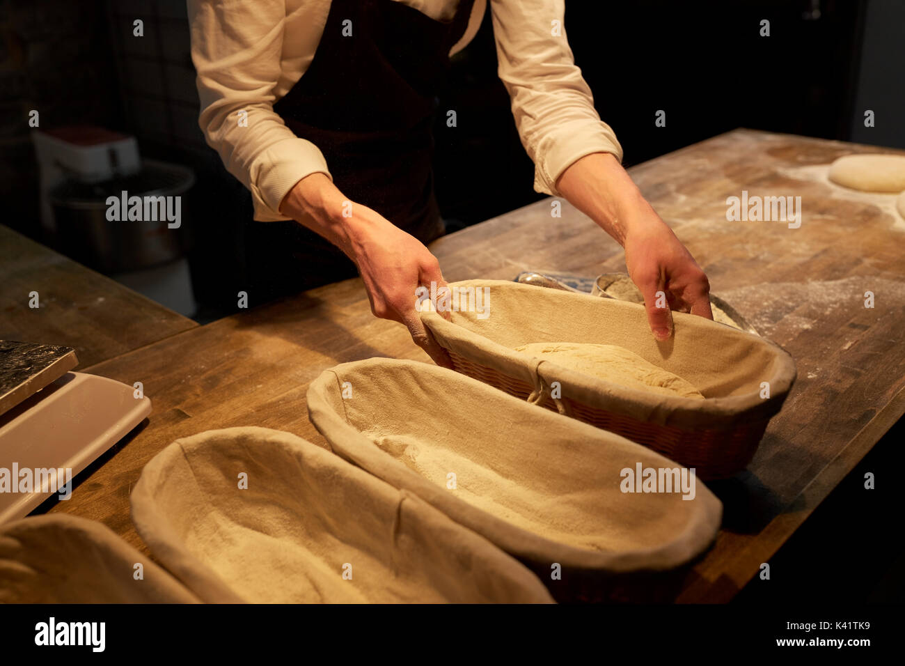Baker man in process hi-res stock photography and images - Alamy