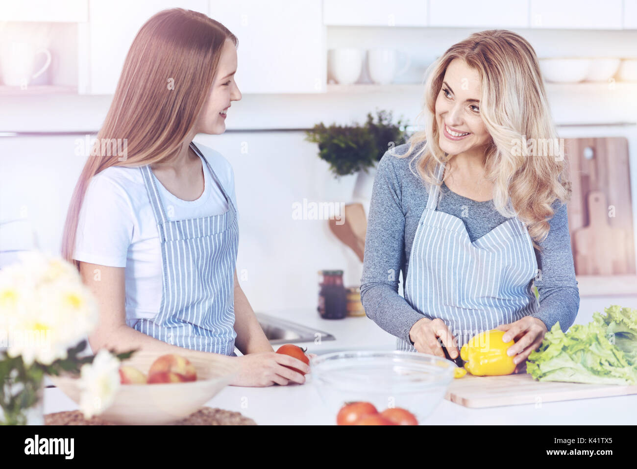 Mother and daughter cooking tradition hi-res stock photography and ...