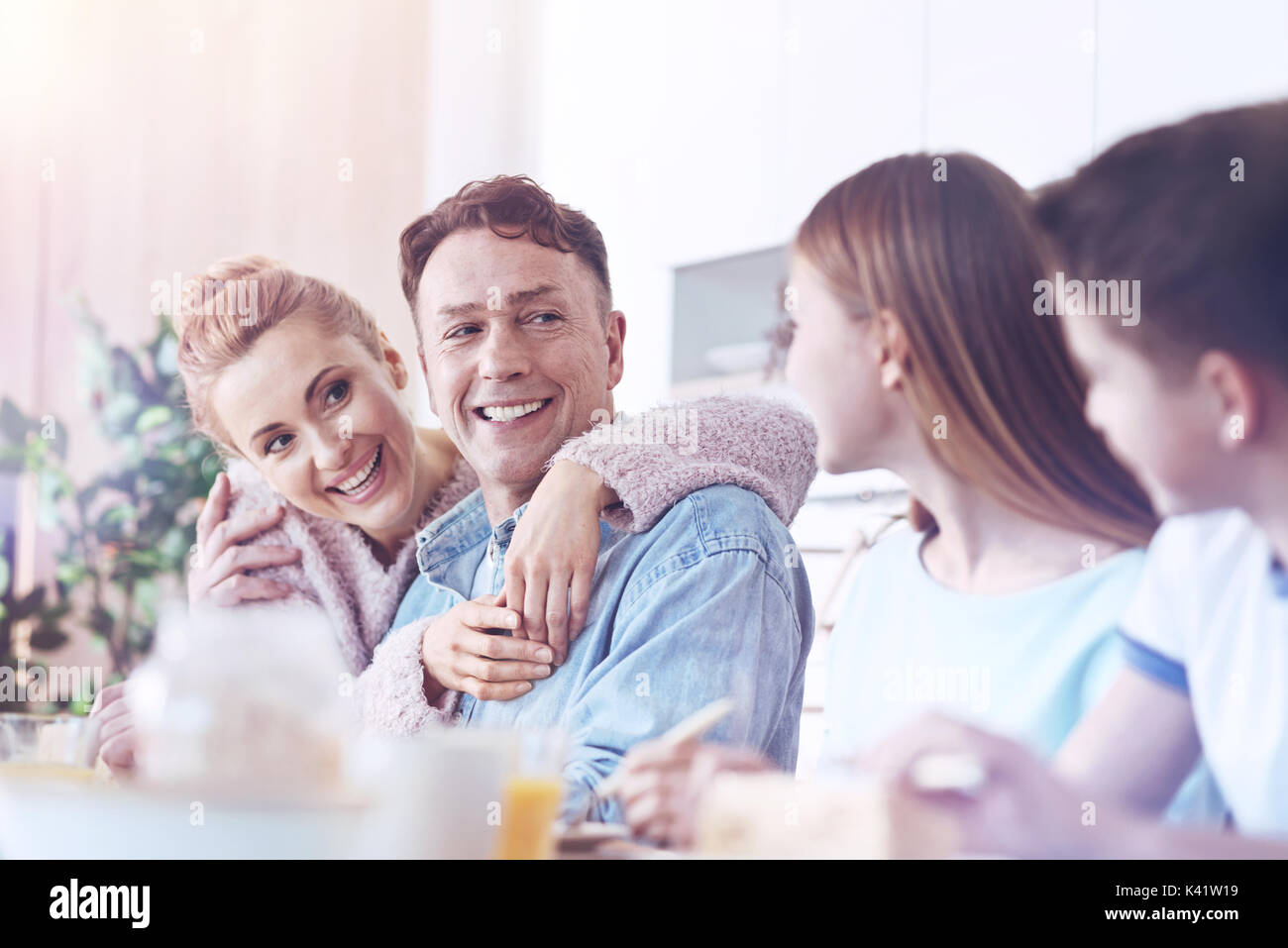 Happy family chatting hi-res stock photography and images - Alamy